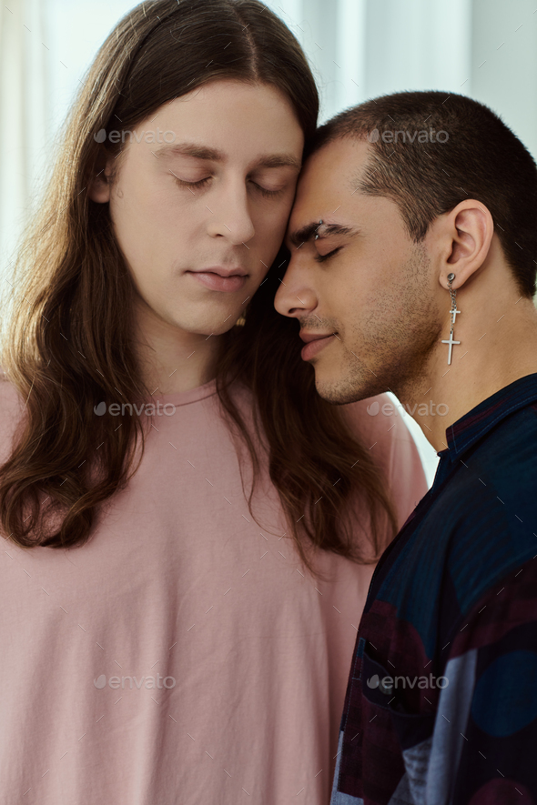 Harmony in unity: gay couple stand together Stock Photo by ...