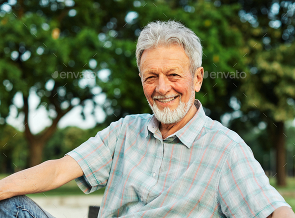 man outdoor senior happy retirement elderly portrait male active park ...