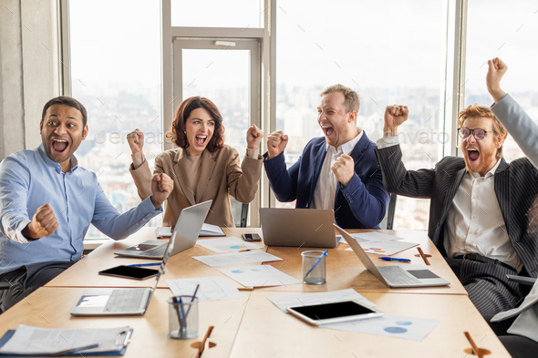Excited Business Team Celebrating Success in Modern Office Stock Photo ...