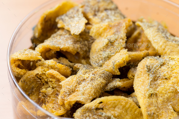 Delicious crispy fish skin snack Stock Photo by leungchopan | PhotoDune