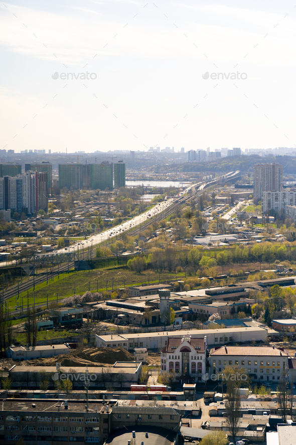view from the roof of huge metropolis, many houses urban spring ...