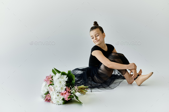 Young Gymnast With Prosthetic Leg Poses With Flowers Stock Photo by ...