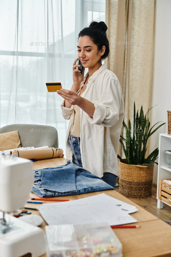 Modern Eco Chic: Woman Transforming Clothes on Phone Stock Photo by ...