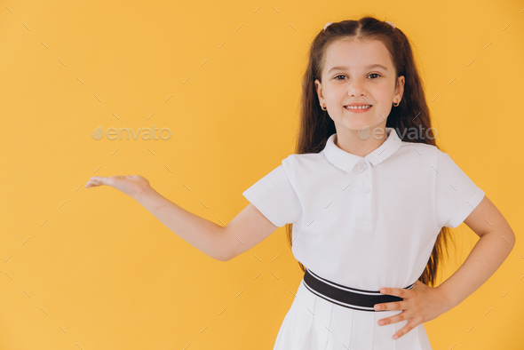 Little girl with dimples on cheeks smiling wearing school uniform Stock ...