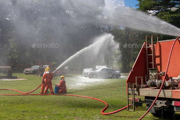 Firefighter Concept. Several firefighters go offensive for a fire ...