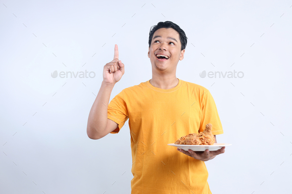Man Pointing Upwards Have Idea While Holding Fried Chickens Stock Photo ...