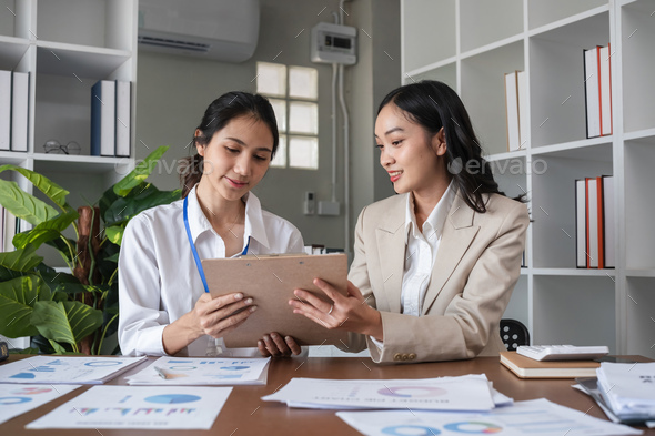 Team of Accountant Collaborating and Sharing Ideas in a Modern Office ...