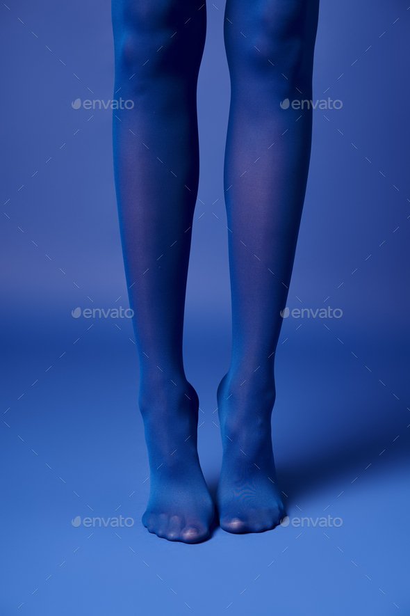 Sapphire stems: young womans bold blue stockings Stock Photo by ...