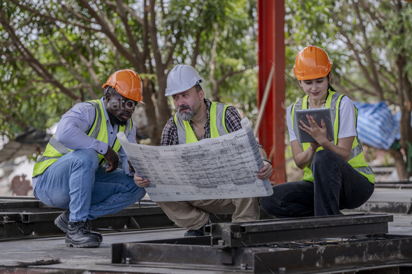 Engineer or worker architecture wearing safety uniform survey and ...