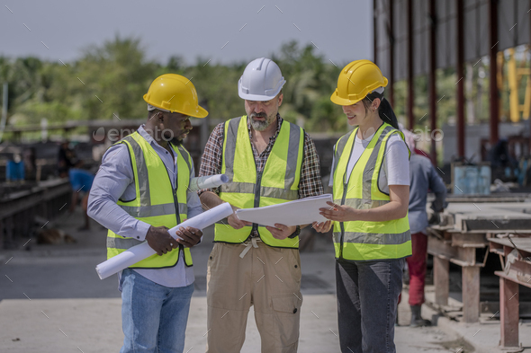 Engineer or worker architecture wearing safety uniform survey and ...