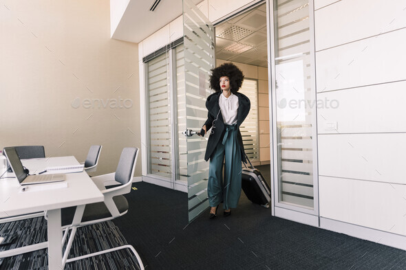 Confident professional entering a modern office meeting room. Stock ...