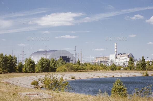 A tranquil view with the New Safe Confinement structure covering the ...