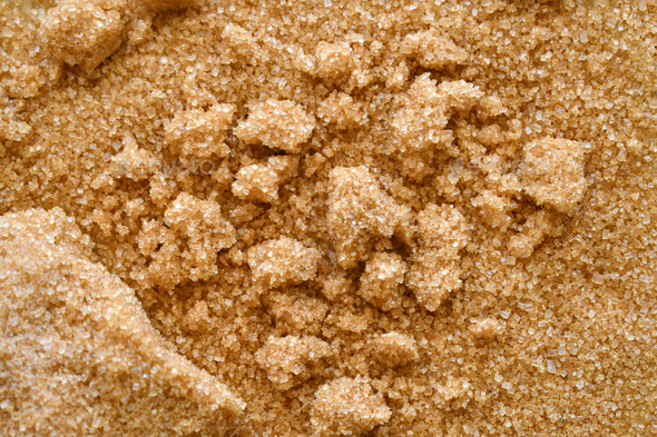 Clumped brown sugar texture background. Stock Photo by Maliflower73