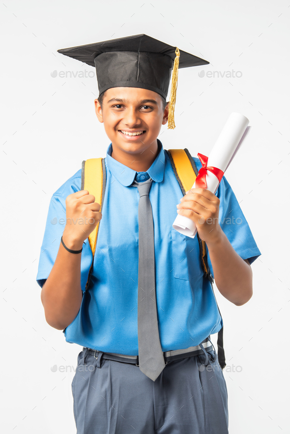 Indian Asian student, school boy in uniform with graduation cap ...