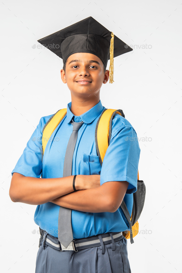 Indian Asian student, school boy in uniform with graduation cap ...