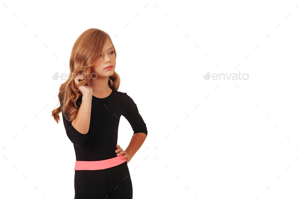 Sporty little girl model posing in gymnastics sportswear isolated Stock ...