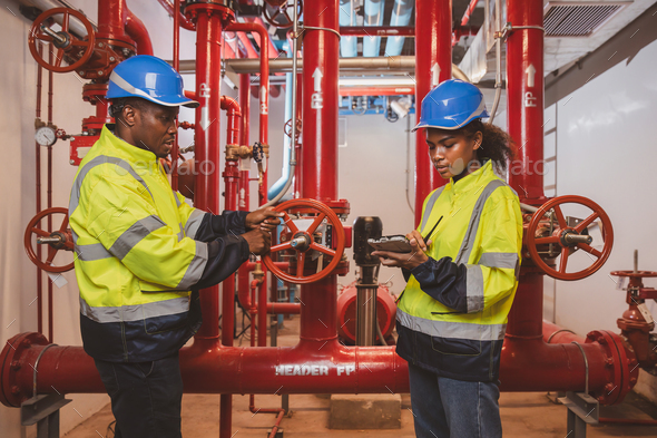 Engineer or technician work checking Fire suppression system and fire ...