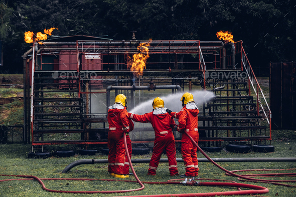 Firefighter Concept. Several firefighters go offensive for a fire ...