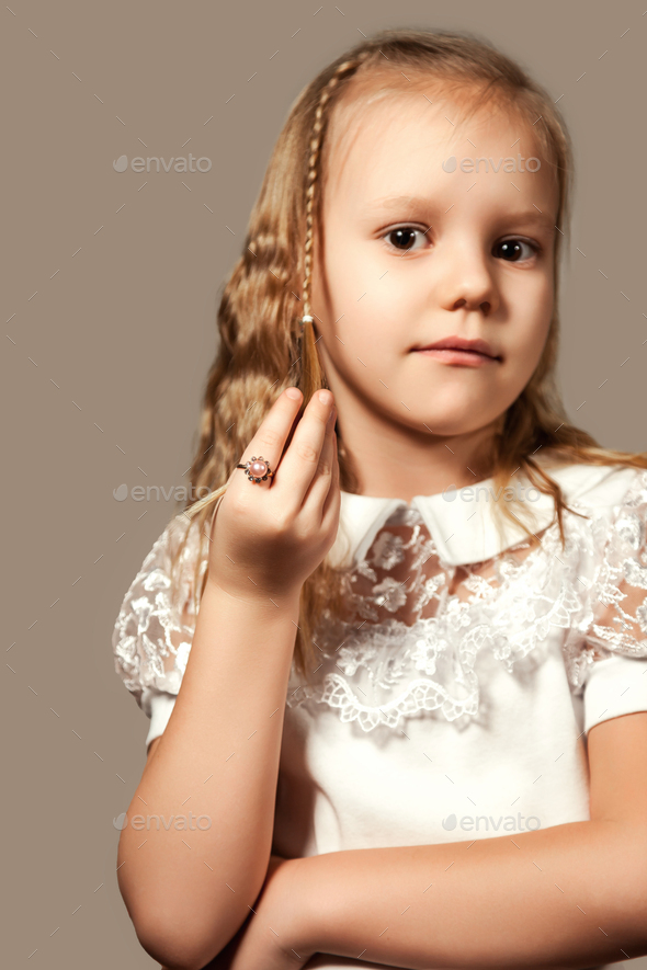 Little positive cover girl child model 5 year old poses with ring on ...
