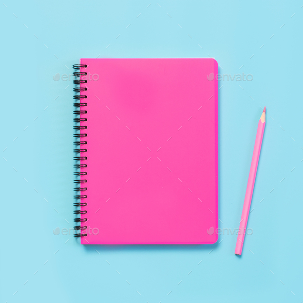 Pink girlish school supplies, notebooks and pens on punchy blue. Top ...