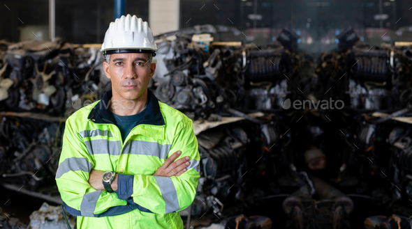 Portrait of man professional engineering arms crossed worker wear ...