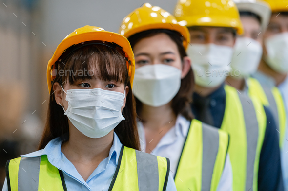 Teamwork engineer in uniform wear protection mask brainstorming ...
