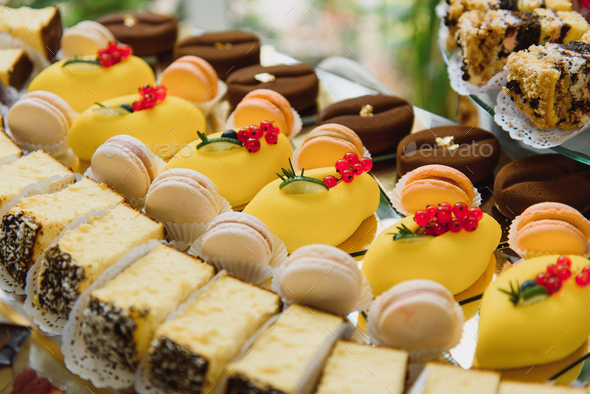 desserts with fruits, mousse, biscuits. Different types of sweet ...