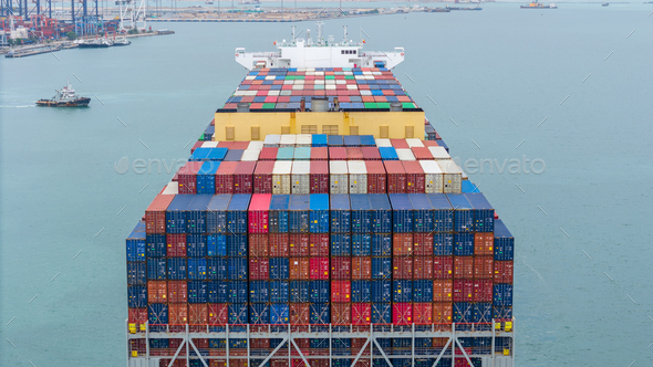 stern of Cargo container ship carrying container and running in ...
