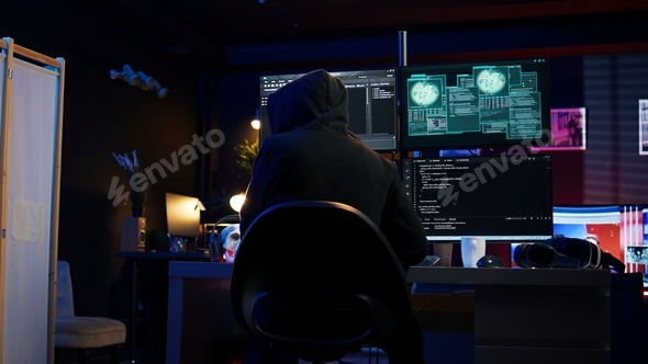 Hacker breaking down security systems defenses using rogue scripts ...