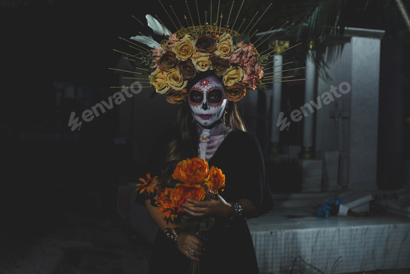 Catrina in a cemetery. Day of the dead celebration. Mexican culture ...