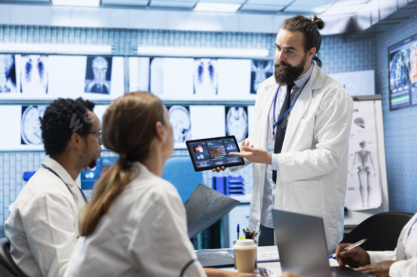 Healthcare professionals review mri scan test results and neurology x ...