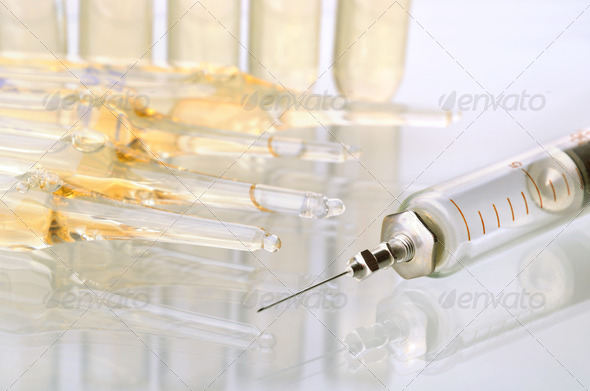 Vintage syringe and glass vials Stock Photo by eAlisa | PhotoDune