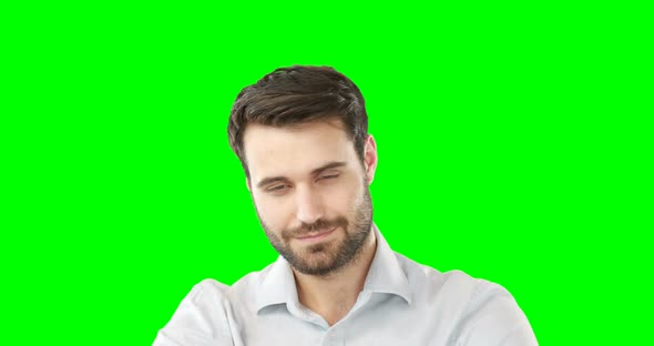 Smiling man standing against green screen, Stock Footage | VideoHive