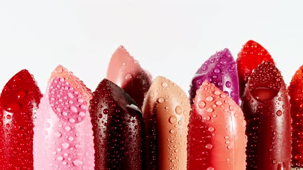 Colorful Lipstick Palette Rotation on White Background, Stock Footage