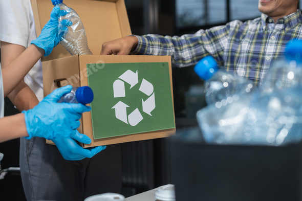 Business people working examining waste recyclable separation divided ...
