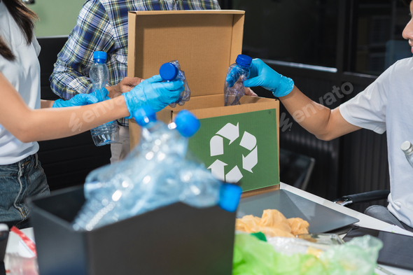 Business people working examining waste recyclable separation divided ...