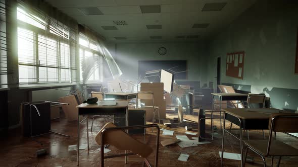 Demolished classroom with overturned desks and chairs. Damaged teaching ...