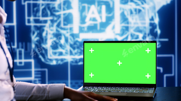 Green screen laptop updating AI systems Stock Photo by DC_Studio | PhotoDune