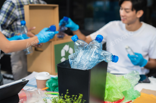 Business people working examining waste recyclable separation divided ...