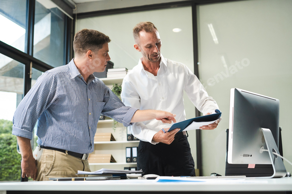 Male colleague caucasian working and update tasks with milestones ...