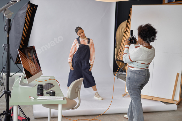 Photographer Taking Pictures of Gen Z Young Girl in Studio Stock Photo ...