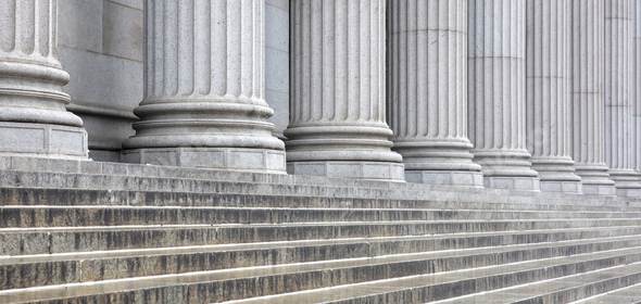 Stone colonnade and stairs detail. Classical pillars row in a building ...