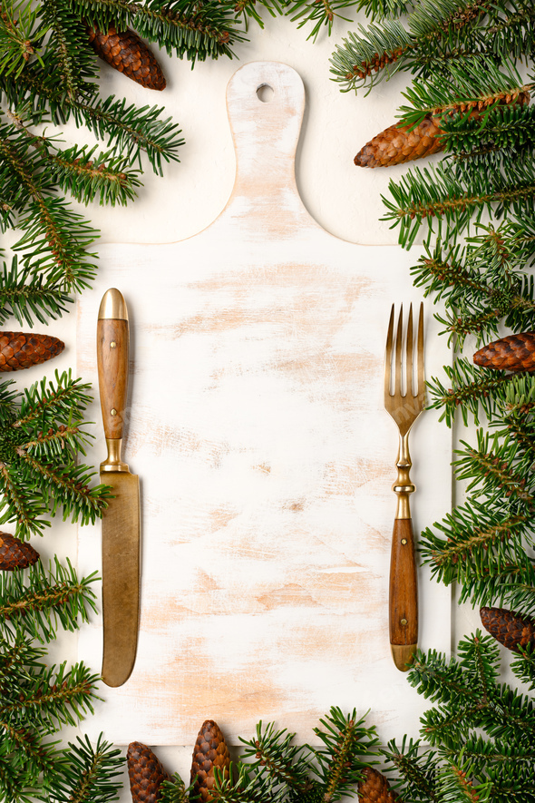 Christmas dinner menu background from white wooden cutting board Stock Photo by ivankmit