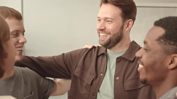 Man Reassuring Team at Work, Stock Footage | VideoHive