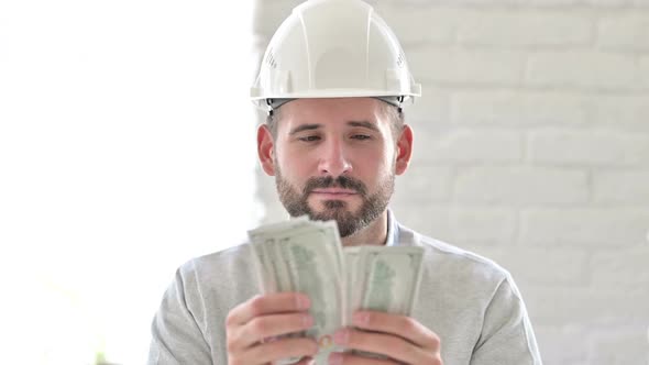 Portrait of Ambitious Young Engineer Counting Dollars, Stock Footage