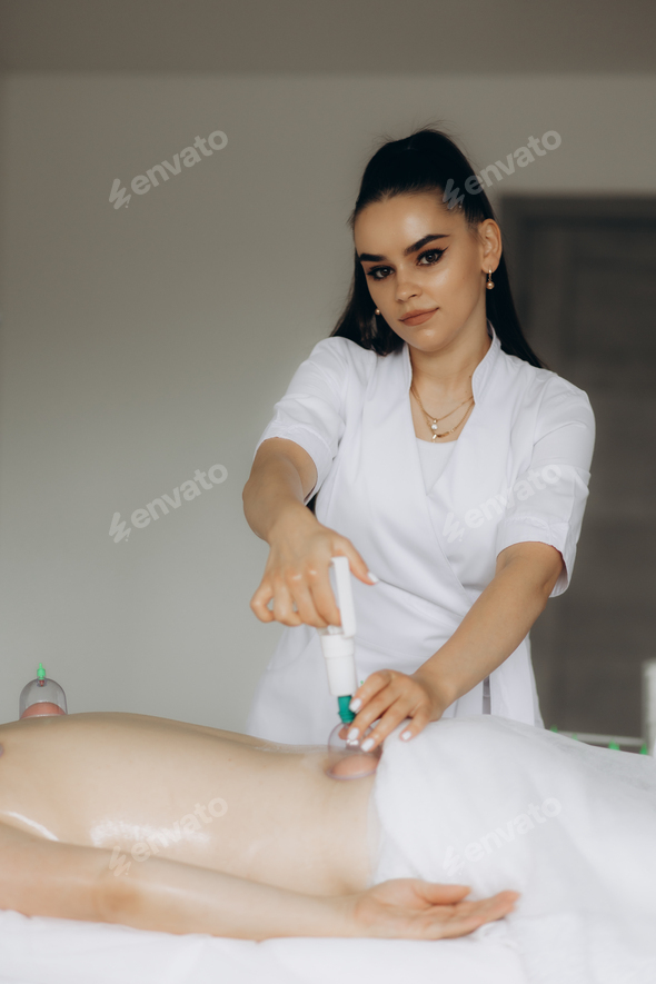 A traditional session captures blood cupping therapy, traditional ...