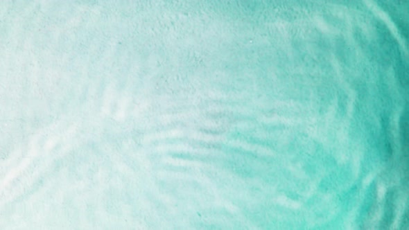 Super Slow Motion Shot of Clear Cyan Sea Surface Waving Over White Sand ...