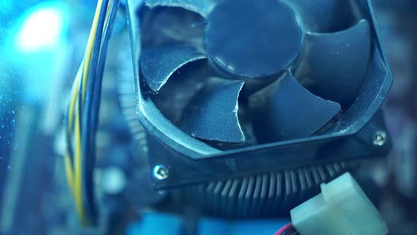 PC Components in Dust. Extra Close-up CPU Fan. Dust Flies Around. He ...