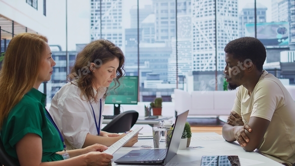 HR manager conducting a detailed interview with a potential candidate ...