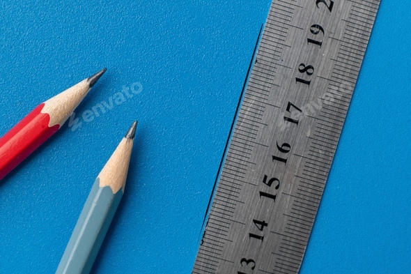 drawing a line on a color surface with a ruler and a pencil Stock Photo ...